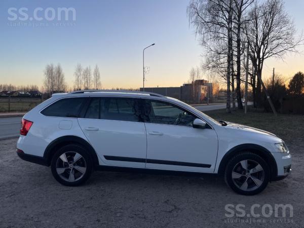 White Skoda Octavia 2015 in Riga, with an engine capacity of 2.00 L and mileage of 257 thousand km for 10890 €, photo 6 on AUTOMOTO.COM.LV