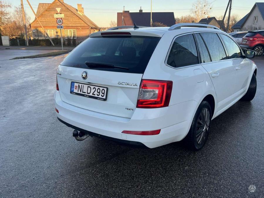 White Skoda Octavia 2015 in Vilnius, with an engine capacity of 1.97 L and mileage of 251 thousand km for 8250 €, photo 4 on AUTOMOTO.COM.LV
