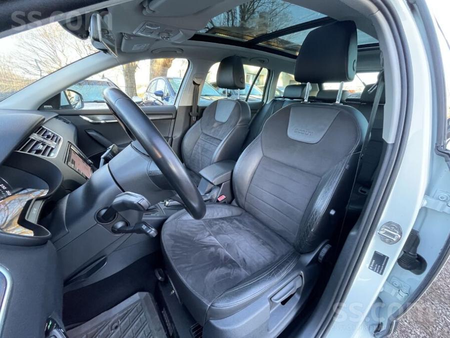 White Skoda Octavia 2015 in Riga, with an engine capacity of 2.00 L and mileage of 257 thousand km for 9990 €, photo 12 on AUTOMOTO.COM.LV