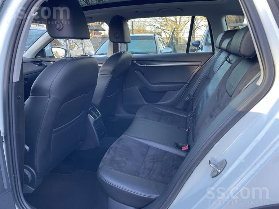 White Skoda Octavia 2015 in Riga, with an engine capacity of 2.00 L and mileage of 257 thousand km for 9990 €, photo 13 on AUTOMOTO.COM.LV