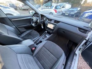 White Skoda Octavia 2015 in Riga, with an engine capacity of 2.00 L and mileage of 257 thousand km for 9990 €, photo 19 on AUTOMOTO.COM.LV
