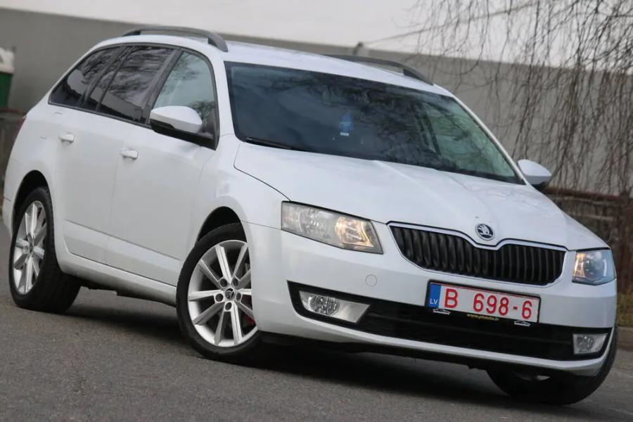 White Skoda Octavia 2015 in Riga, with an engine capacity of 1.40 L and mileage of 261 thousand km for 5790 €, photo 4 on AUTOMOTO.COM.LV