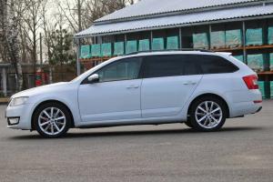 White Skoda Octavia 2015 in Riga, with an engine capacity of 1.40 L and mileage of 261 thousand km for 5790 €, photo 6 on AUTOMOTO.COM.LV