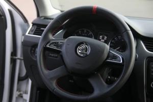White Skoda Octavia 2015 in Riga, with an engine capacity of 1.40 L and mileage of 261 thousand km for 5790 €, photo 11 on AUTOMOTO.COM.LV