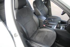 White Skoda Octavia 2015 in Riga, with an engine capacity of 1.40 L and mileage of 261 thousand km for 5790 €, photo 14 on AUTOMOTO.COM.LV