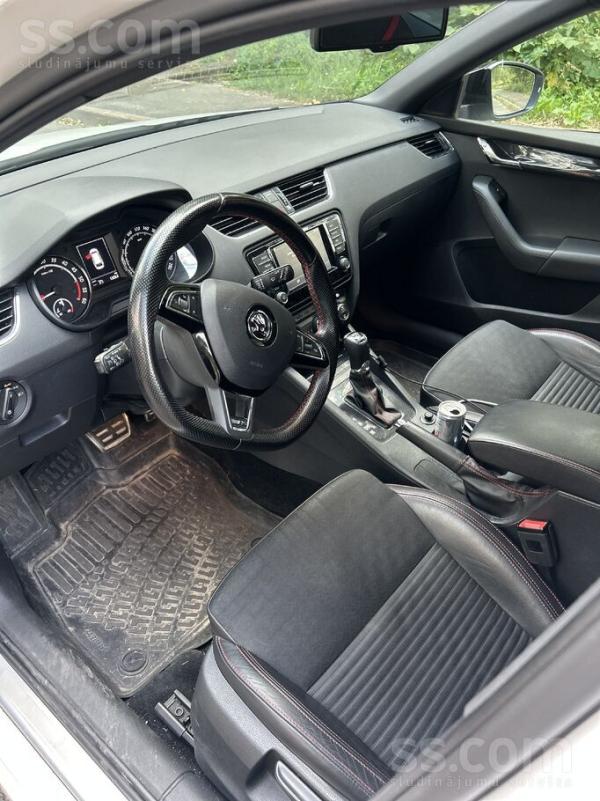 White Skoda Octavia 2015 in Riga, with an engine capacity of 2.00 L and mileage of 275 thousand km for 10150 €, photo 6 on AUTOMOTO.COM.LV
