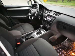 White Skoda Octavia 2015 in Vilnius, with an engine capacity of 1.60 L and mileage of 246 thousand km for 6633 €, photo 12 on AUTOMOTO.COM.LV