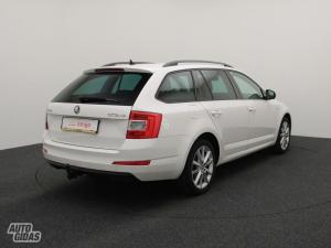 White Skoda Octavia 2016 in Vilnius, with an engine capacity of 1.40 L and mileage of 235 thousand km for 7999 €, photo 8 on AUTOMOTO.COM.LV