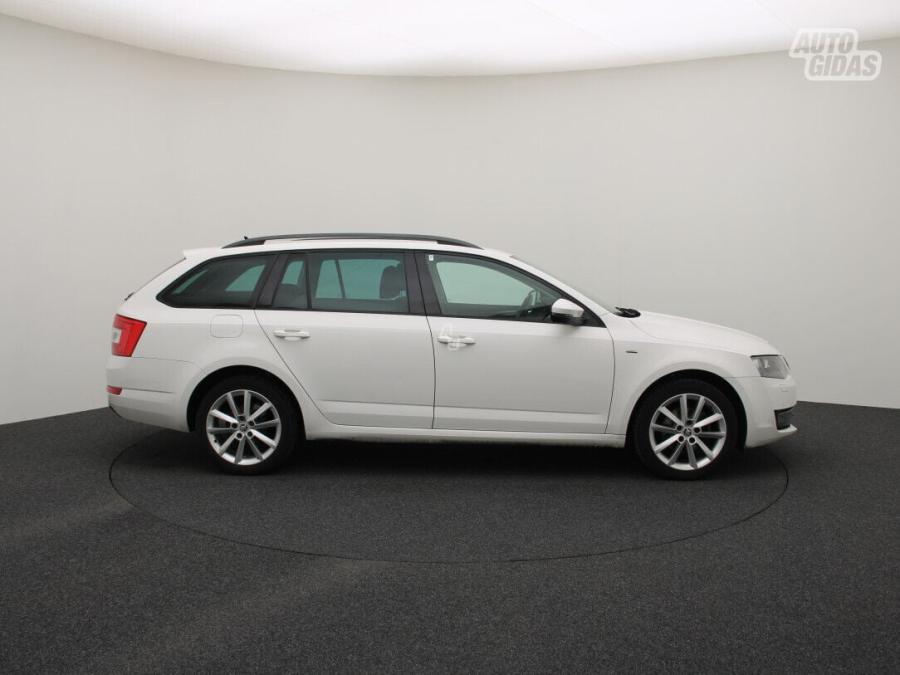 White Skoda Octavia 2016 in Vilnius, with an engine capacity of 1.40 L and mileage of 235 thousand km for 7999 €, photo 9 on AUTOMOTO.COM.LV