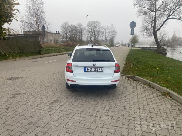 White Skoda Octavia 2016 in Riga, with an engine capacity of 2.00 L and mileage of 260 thousand km for 7500 €, photo 4 on AUTOMOTO.COM.LV