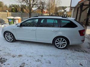 White Skoda Octavia 2017 in Riga, with an engine capacity of 2.00 L and mileage of 235 thousand km for 8150 €, photo 5 on AUTOMOTO.COM.LV