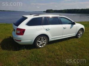 White Skoda Octavia 2017 in Ogre, with an engine capacity of 2.00 L and mileage of 298 thousand km for 7700 €, photo 4 on AUTOMOTO.COM.LV