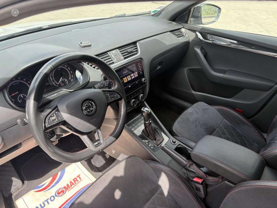 White Skoda Octavia 2017 in Taurage, with an engine capacity of 1.97 L and mileage of 255 thousand km for 11000 €, photo 13 on AUTOMOTO.COM.LV