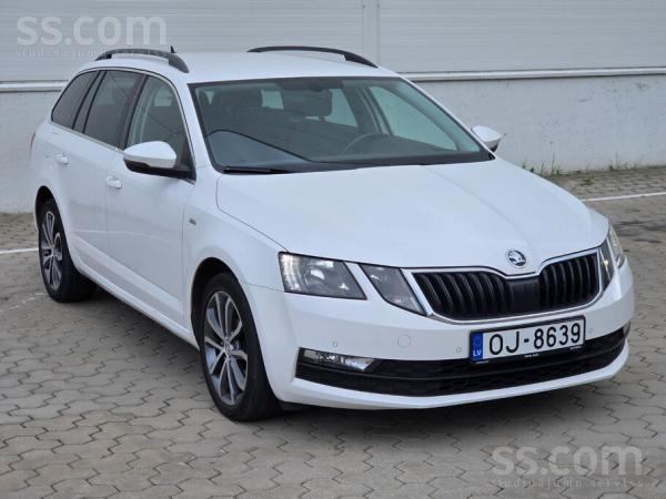 White Skoda Octavia 2017 in Riga, with an engine capacity of 2.00 L and mileage of 238 thousand km for 8990 €, photo 5 on AUTOMOTO.COM.LV