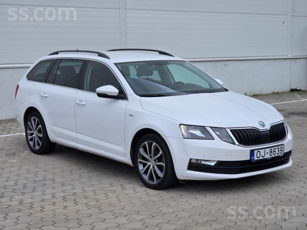 White Skoda Octavia 2017 in Riga, with an engine capacity of 2.00 L and mileage of 238 thousand km for 8990 €, photo 6 on AUTOMOTO.COM.LV