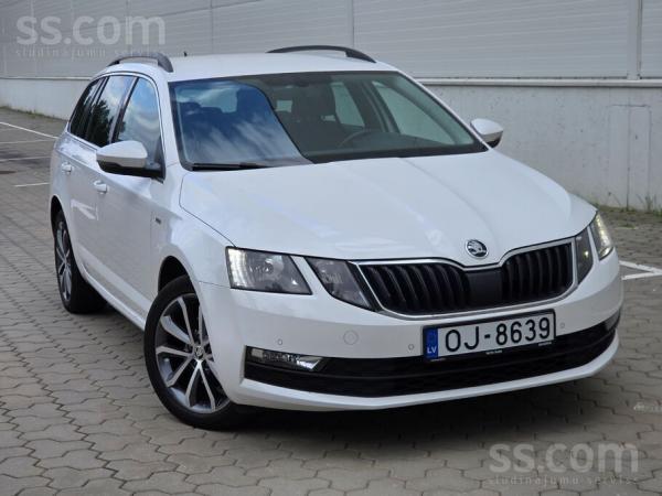 White Skoda Octavia 2017 in Riga, with an engine capacity of 2.00 L and mileage of 238 thousand km for 8990 €, photo 7 on AUTOMOTO.COM.LV