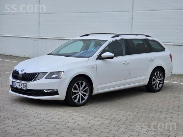 White Skoda Octavia 2017 in Riga, with an engine capacity of 2.00 L and mileage of 238 thousand km for 8990 €, photo 9 on AUTOMOTO.COM.LV