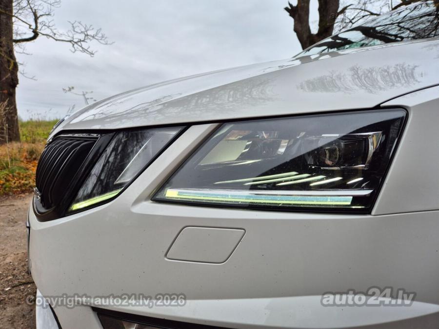 White Skoda Octavia 2018 in Tallinn, with an engine capacity of 2.00 L and mileage of 192 thousand km for 14990 €, photo 22 on AUTOMOTO.COM.LV