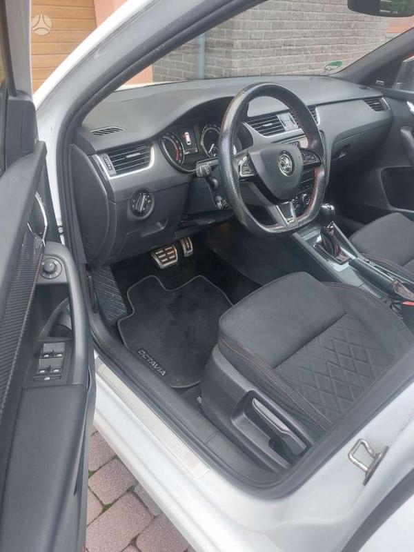 White Skoda Octavia 2019 in Kaunas, with an engine capacity of 1.97 L and mileage of 260 thousand km for 12950 €, photo 9 on AUTOMOTO.COM.LV