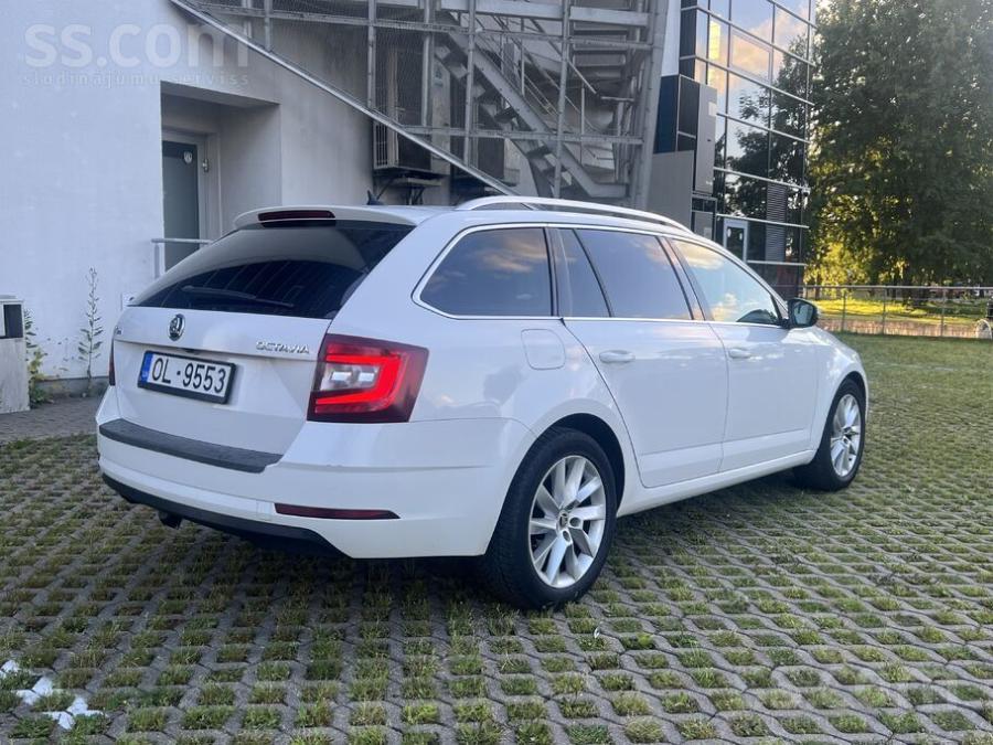 White Skoda Octavia 2019 in Riga, with an engine capacity of 2.00 L and mileage of 378 thousand km for 7990 €, photo 4 on AUTOMOTO.COM.LV