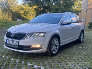 White Skoda Octavia 2019 in Riga, with an engine capacity of 2.00 L and mileage of 378 thousand km for 7990 €, photo 5 on AUTOMOTO.COM.LV