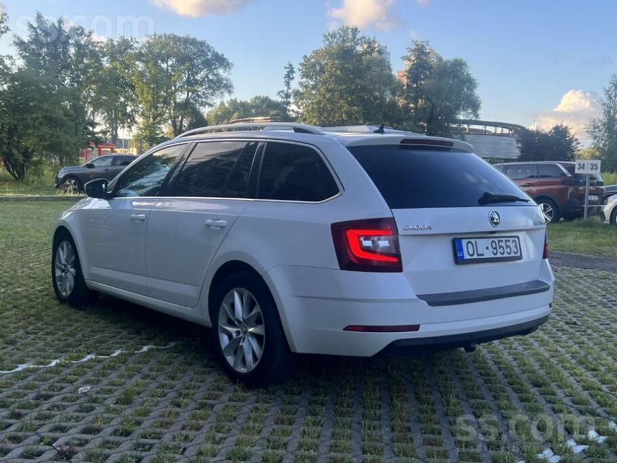 White Skoda Octavia 2019 in Riga, with an engine capacity of 2.00 L and mileage of 378 thousand km for 7990 €, photo 6 on AUTOMOTO.COM.LV