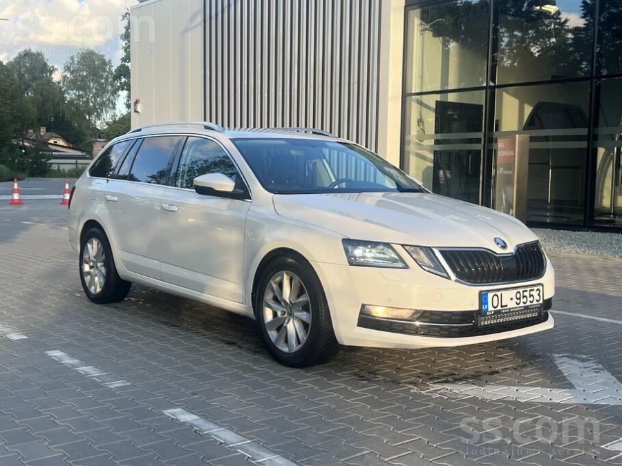 White Skoda Octavia 2019 in Riga, with an engine capacity of 2.00 L and mileage of 378 thousand km for 7990 €, photo 9 on AUTOMOTO.COM.LV