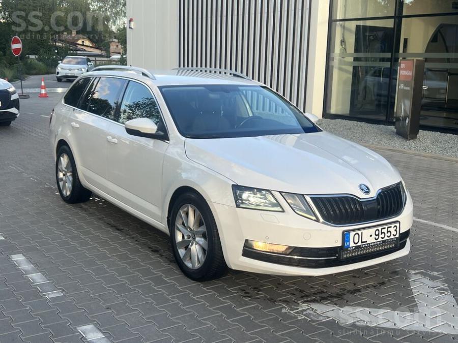 White Skoda Octavia 2019 in Riga, with an engine capacity of 2.00 L and mileage of 378 thousand km for 7990 €, photo 10 on AUTOMOTO.COM.LV