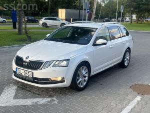 White Skoda Octavia 2019 in Riga, with an engine capacity of 2.00 L and mileage of 378 thousand km for 7990 €, photo 11 on AUTOMOTO.COM.LV