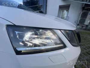 White Skoda Octavia 2019 in Riga, with an engine capacity of 2.00 L and mileage of 378 thousand km for 7990 €, photo 12 on AUTOMOTO.COM.LV