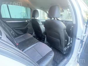 White Skoda Octavia 2019 in Riga, with an engine capacity of 2.00 L and mileage of 378 thousand km for 7990 €, photo 14 on AUTOMOTO.COM.LV