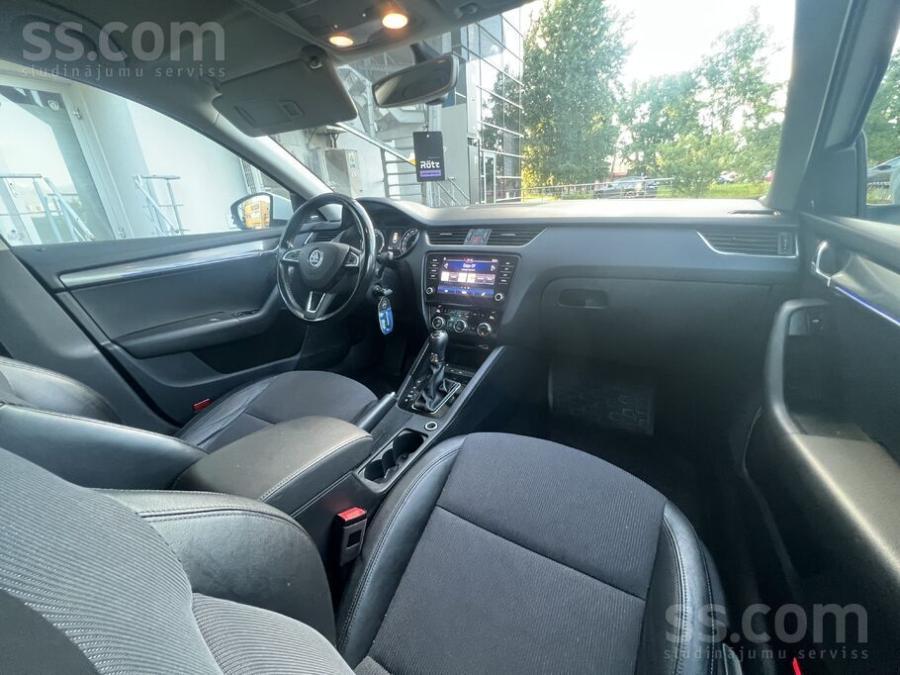 White Skoda Octavia 2019 in Riga, with an engine capacity of 2.00 L and mileage of 378 thousand km for 7990 €, photo 15 on AUTOMOTO.COM.LV