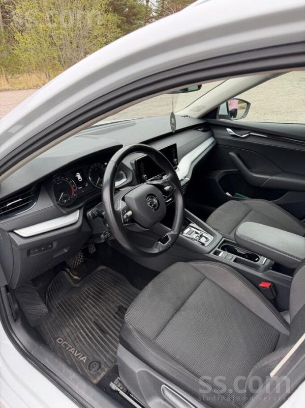 White Skoda Octavia 2020 in Riga, with an engine capacity of 2.00 L and mileage of 194 thousand km for 17350 €, photo 9 on AUTOMOTO.COM.LV