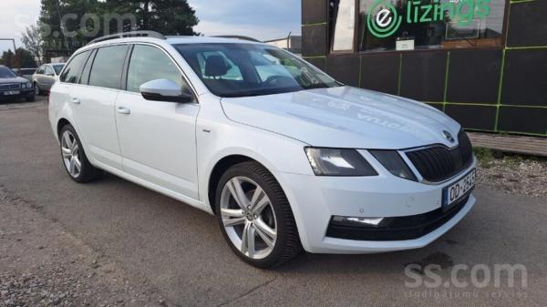 White Skoda Octavia 2020 in Riga, with an engine capacity of 2.00 L and mileage of 409 thousand km for 7990 €, photo 4 on AUTOMOTO.COM.LV