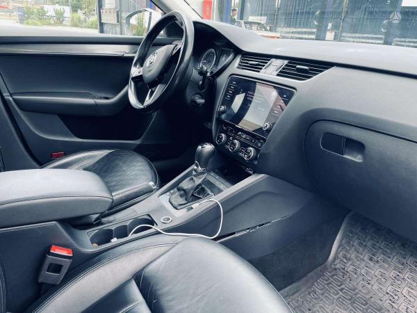 White Skoda Octavia 2020 in Vilnius, with an engine capacity of 1.40 L and mileage of 357 thousand km for 9900 €, photo 9 on AUTOMOTO.COM.LV