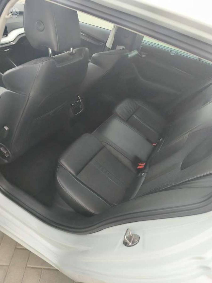 White Skoda Octavia 2020 in Taurage, with an engine capacity of 1.97 L and mileage of 293 thousand km for 11800 €, photo 18 on AUTOMOTO.COM.LV