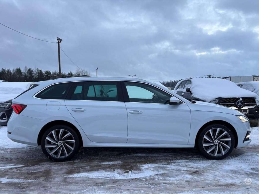 White Skoda Octavia 2021 in Vilnius, with an engine capacity of 1.40 L and mileage of 100 thousand km for 17300 €, photo 4 on AUTOMOTO.COM.LV