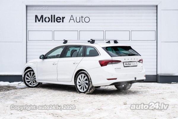 White Skoda Octavia 2021 in Riga, with an engine capacity of 1.40 L and mileage of 116 thousand km for 21981 €, photo 4 on AUTOMOTO.COM.LV