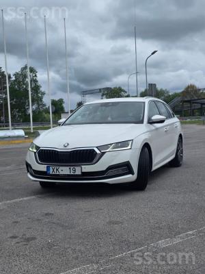White Skoda Octavia 2021 in Riga, with an engine capacity of 1.40 L and mileage of 131 thousand km for 18900 €, photo 3 on AUTOMOTO.COM.LV