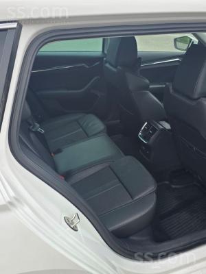 White Skoda Octavia 2021 in Riga, with an engine capacity of 1.40 L and mileage of 131 thousand km for 18900 €, photo 6 on AUTOMOTO.COM.LV