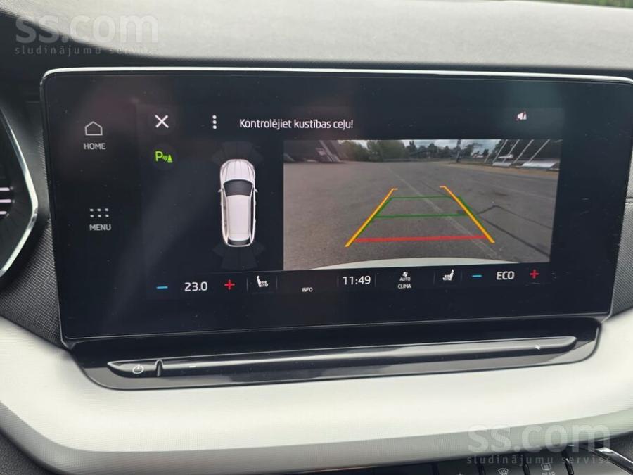 White Skoda Octavia 2021 in Riga, with an engine capacity of 1.40 L and mileage of 131 thousand km for 18900 €, photo 13 on AUTOMOTO.COM.LV