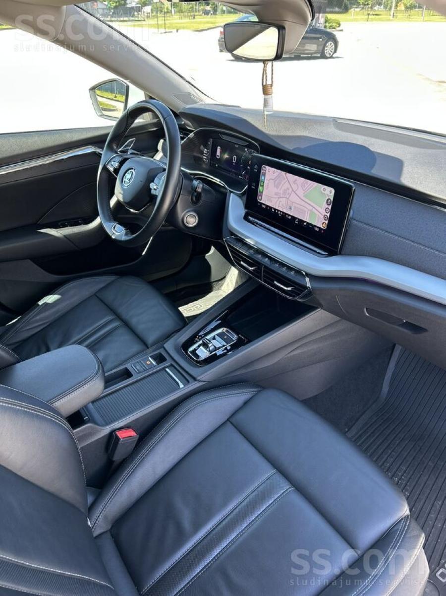 White Skoda Octavia 2021 in Riga, with an engine capacity of 2.00 L and mileage of 97 thousand km for 17500 €, photo 10 on AUTOMOTO.COM.LV