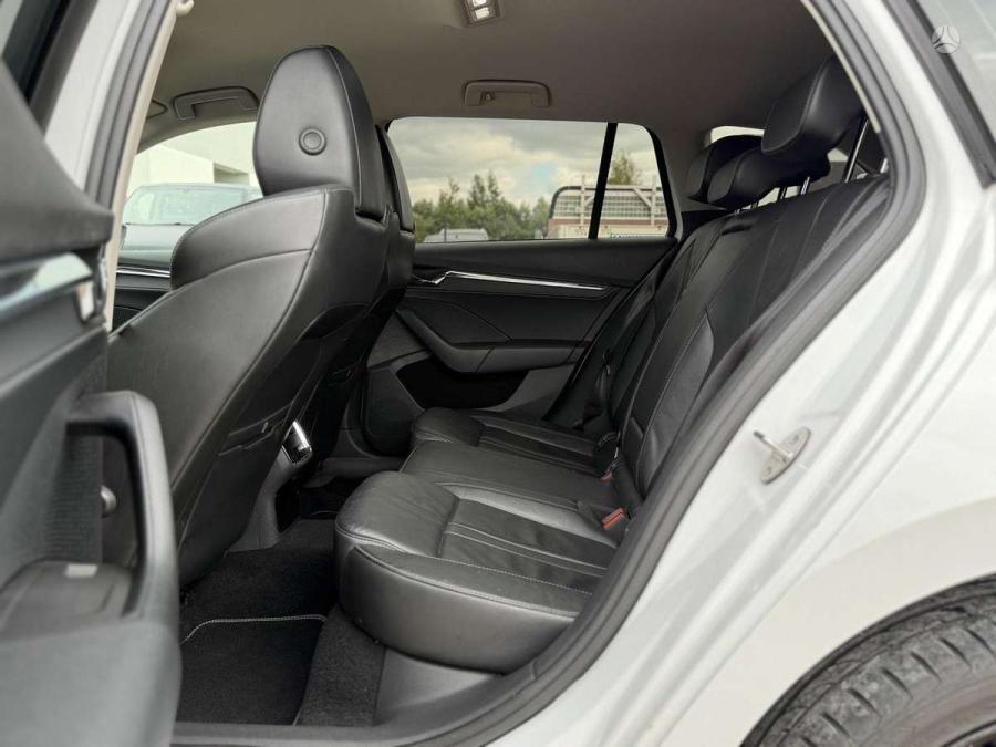 White Skoda Octavia 2021 in Siauliai, with an engine capacity of 1.97 L and mileage of 370 thousand km for 12200 €, photo 13 on AUTOMOTO.COM.LV
