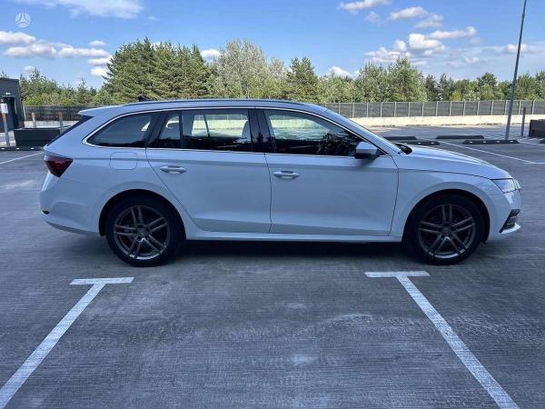 White Skoda Octavia 2022 in Vilnius, with an engine capacity of 1.40 L and mileage of 127 thousand km for 15300 €, photo 4 on AUTOMOTO.COM.LV