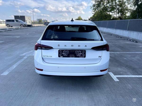 White Skoda Octavia 2022 in Vilnius, with an engine capacity of 1.40 L and mileage of 127 thousand km for 15300 €, photo 6 on AUTOMOTO.COM.LV