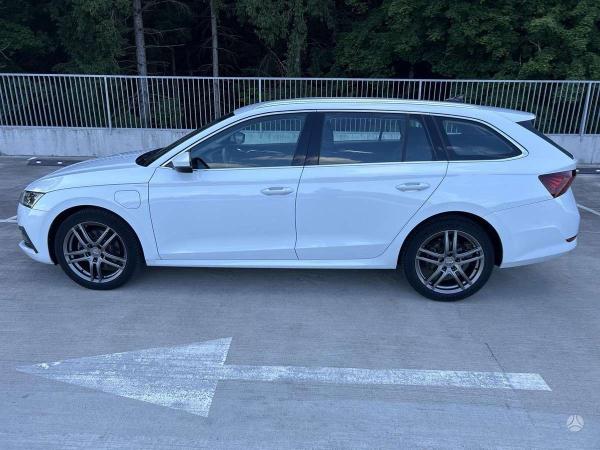 White Skoda Octavia 2022 in Vilnius, with an engine capacity of 1.40 L and mileage of 127 thousand km for 15300 €, photo 8 on AUTOMOTO.COM.LV