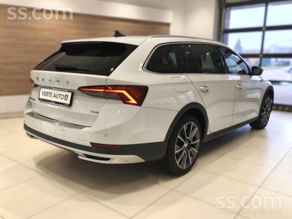 White Skoda Octavia 2023 in Riga, with an engine capacity of 2.00 L and mileage of 221 thousand km for 18990 €, photo 4 on AUTOMOTO.COM.LV