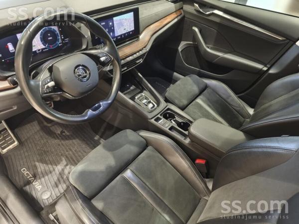 White Skoda Octavia 2023 in Riga, with an engine capacity of 2.00 L and mileage of 221 thousand km for 18990 €, photo 8 on AUTOMOTO.COM.LV