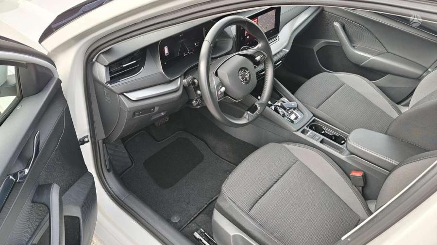 White Skoda Octavia 2023 in Kaunas, with an engine capacity of 2.00 L and mileage of 223 thousand km for 12600 €, photo 10 on AUTOMOTO.COM.LV