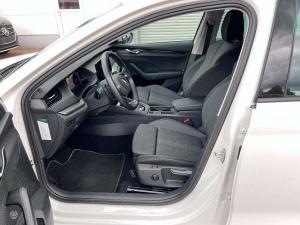 White Skoda Octavia 2023 in Vilnius, with an engine capacity of 1.50 L and mileage of 64 thousand km for 22990 €, photo 11 on AUTOMOTO.COM.LV